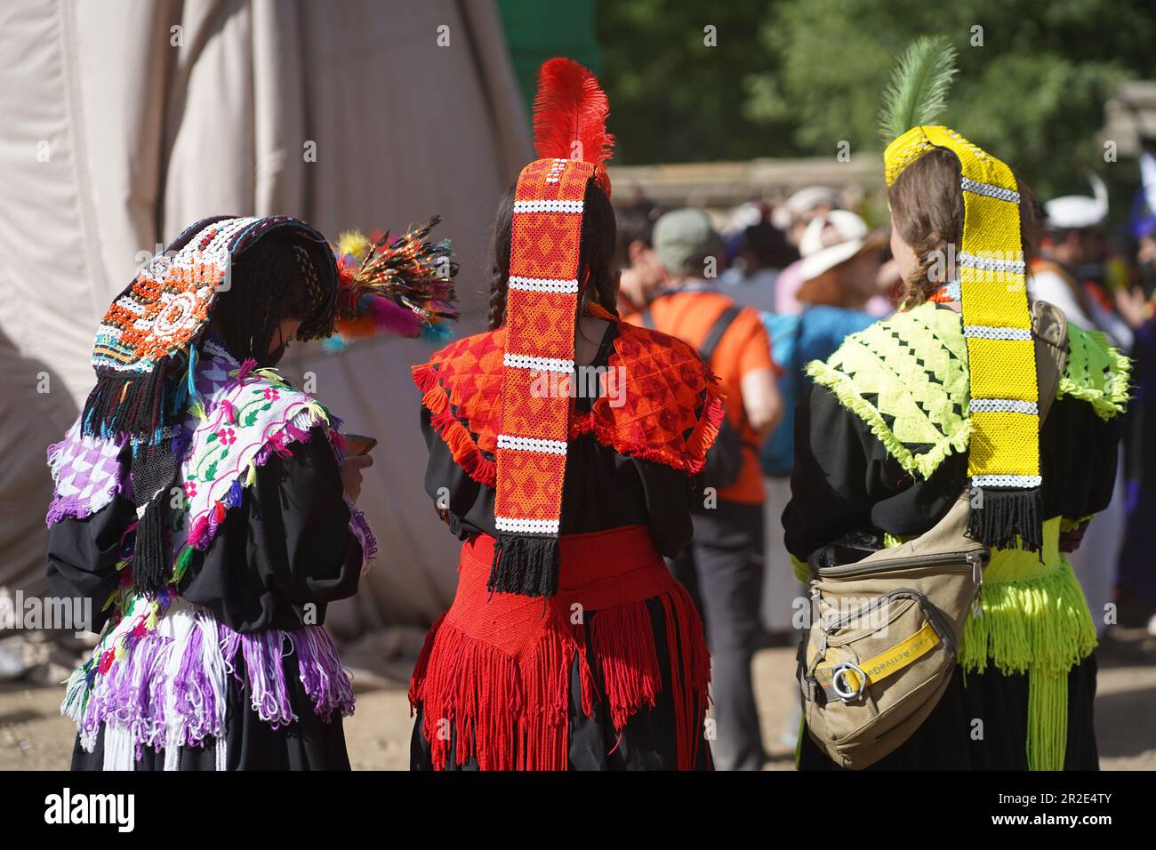 Kalash women wearing traditional headgear in vibrant colours at the ...