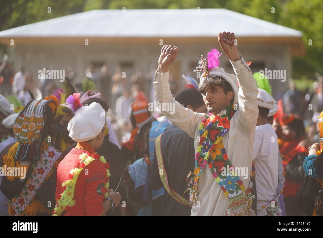 A Kalash man dancing at the Chilam Joshi Festival in Chitral Stock ...