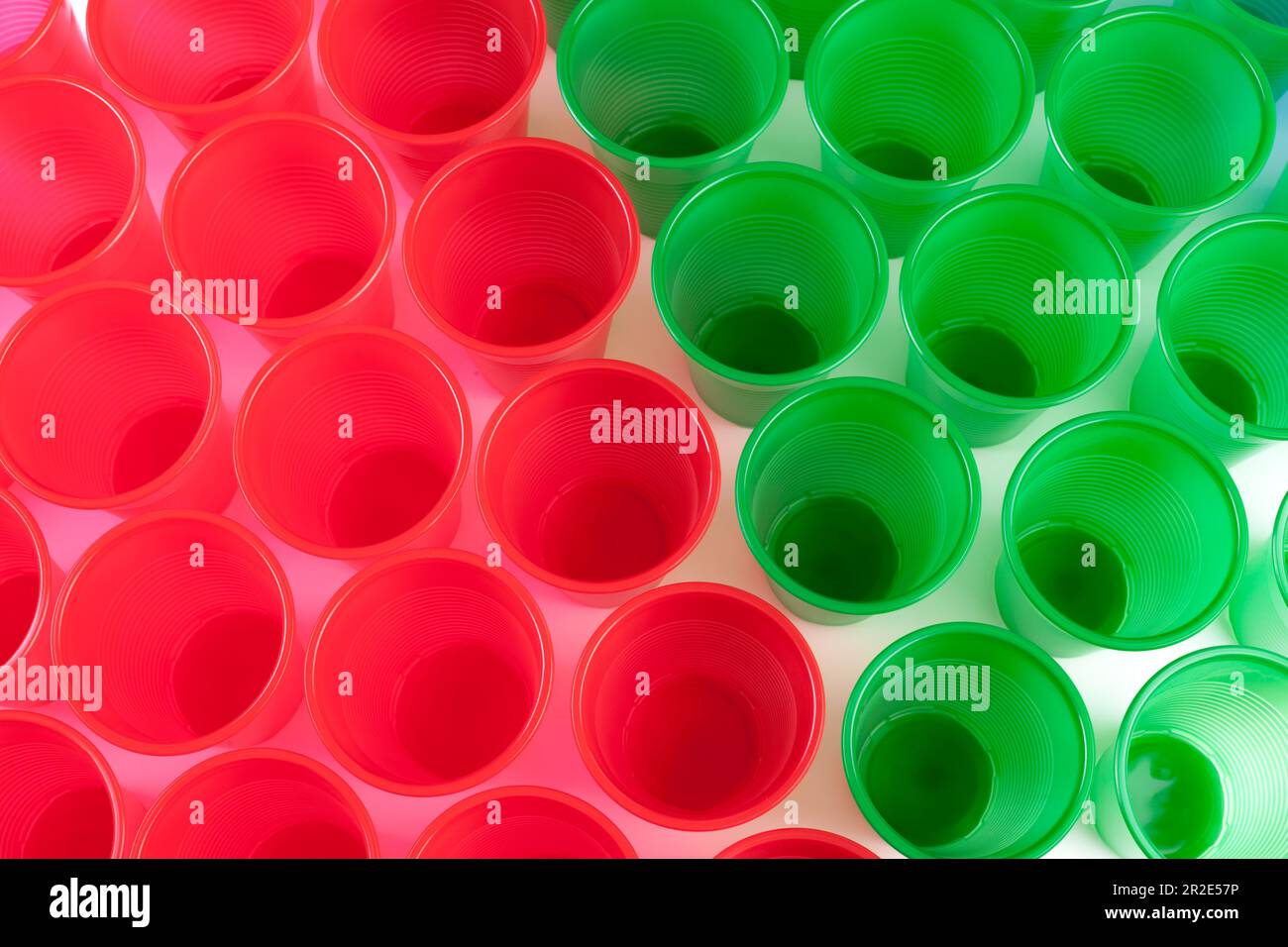 Multicolor plastic glasses isolated on white background Stock Photo - Alamy