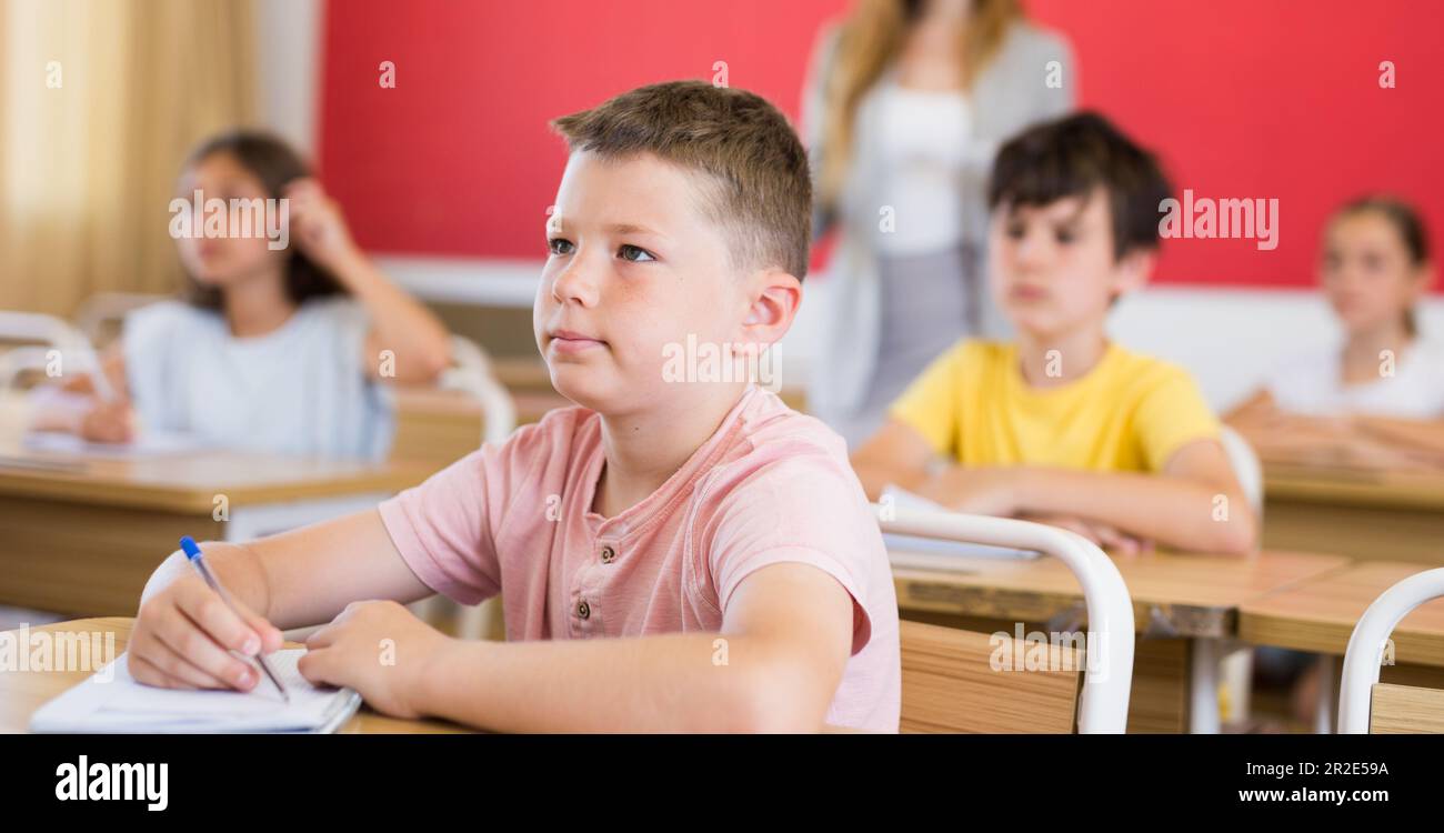 Children sitting in classroom Stock Photo - Alamy