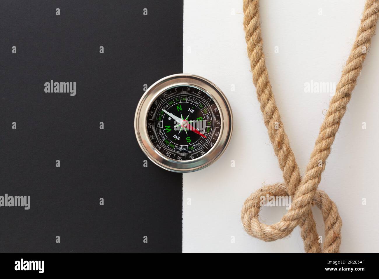 ship ropes and compass Stock Photo - Alamy