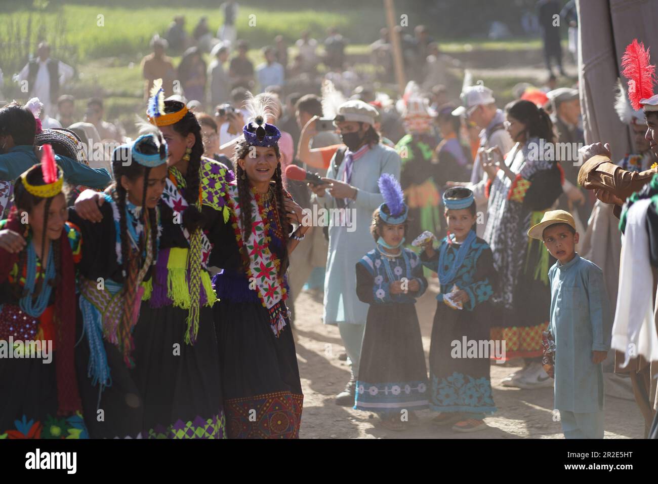 Bamburet, KPK,Pakistan - 05152023: A crowd of Kalash people enjoying ...