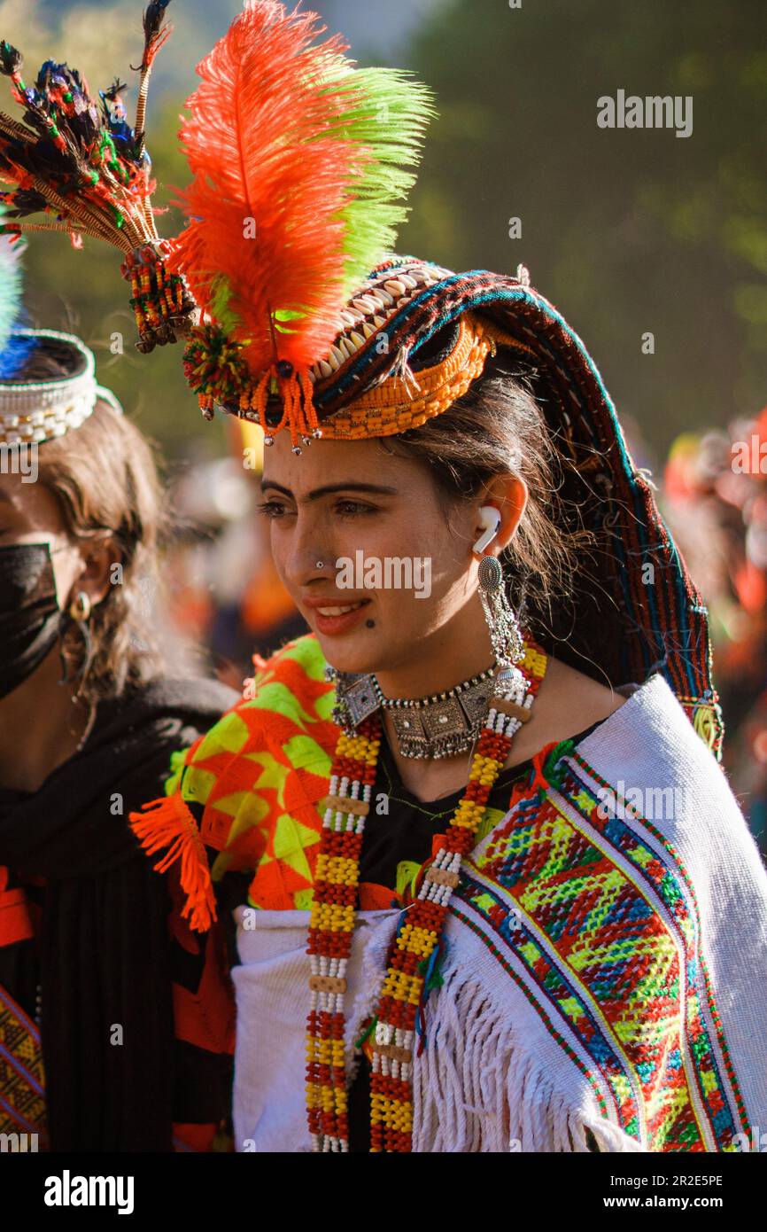 Bamburet, KPK,Pakistan - 05152023: A Kalash woman wearing an airpod ...