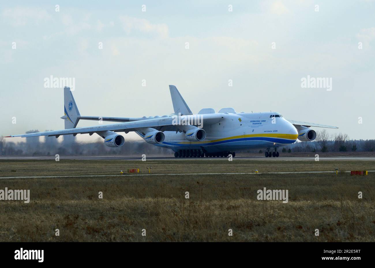 Airlift cargo aircraft Antonov 225 Mriya taking off from a runway of ...