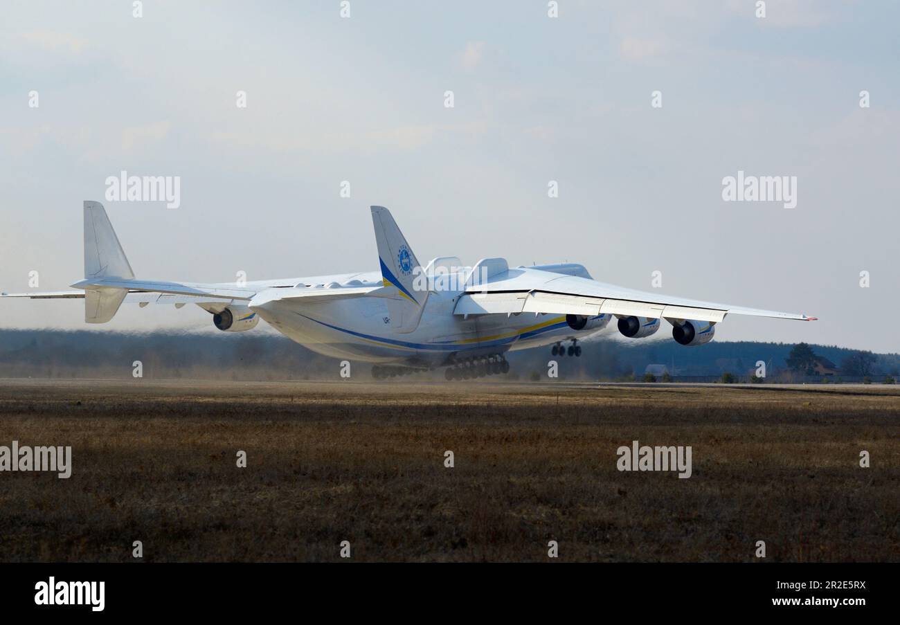 Airlift cargo aircraft Antonov 225 Mriya taking off from a runway of ...