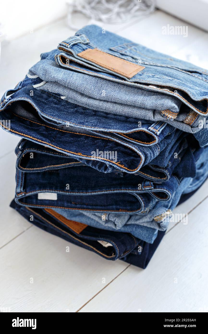 Pile of jeans Stock Photo - Alamy