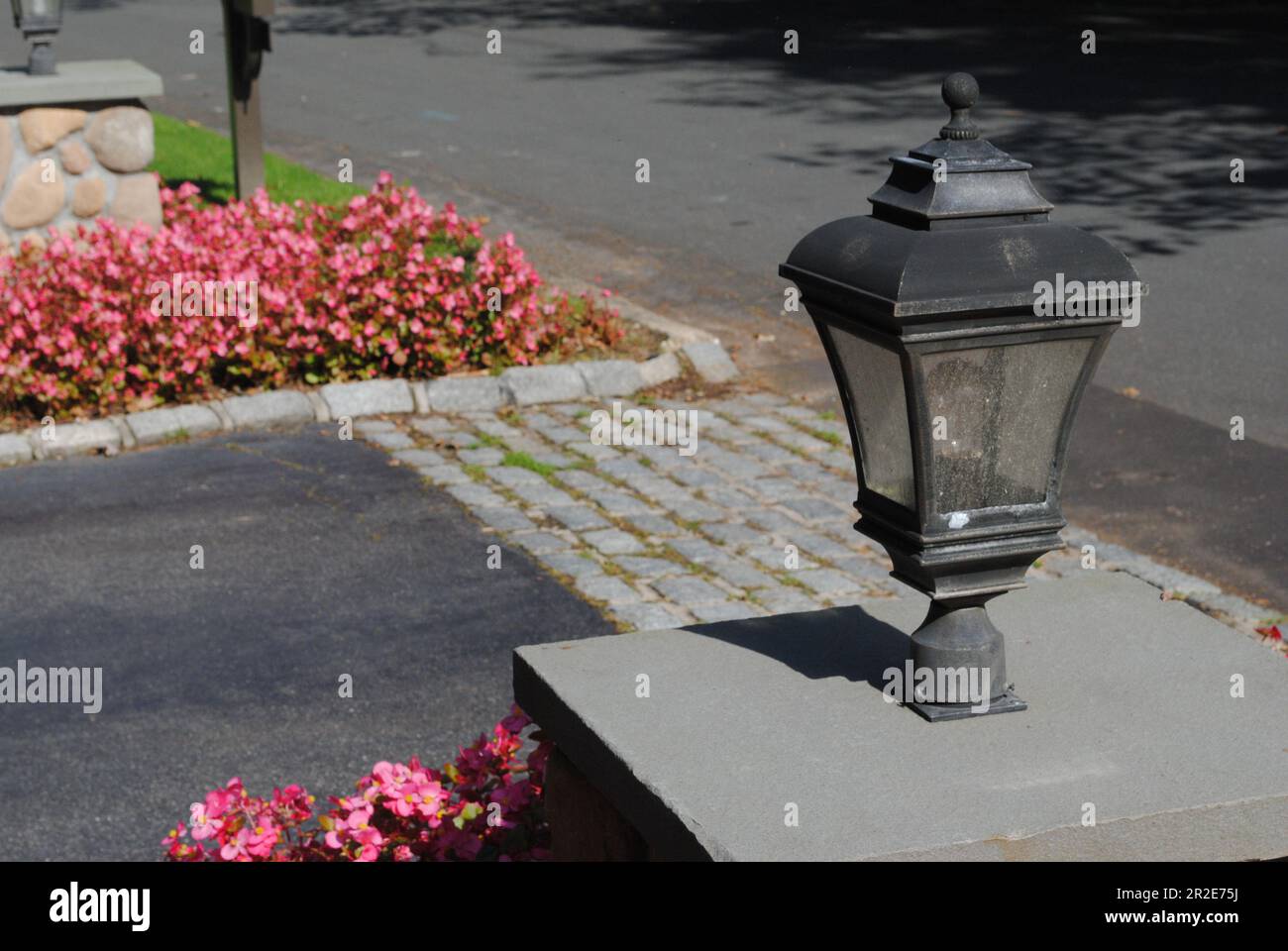 Suburban driveway lamp Stock Photo - Alamy