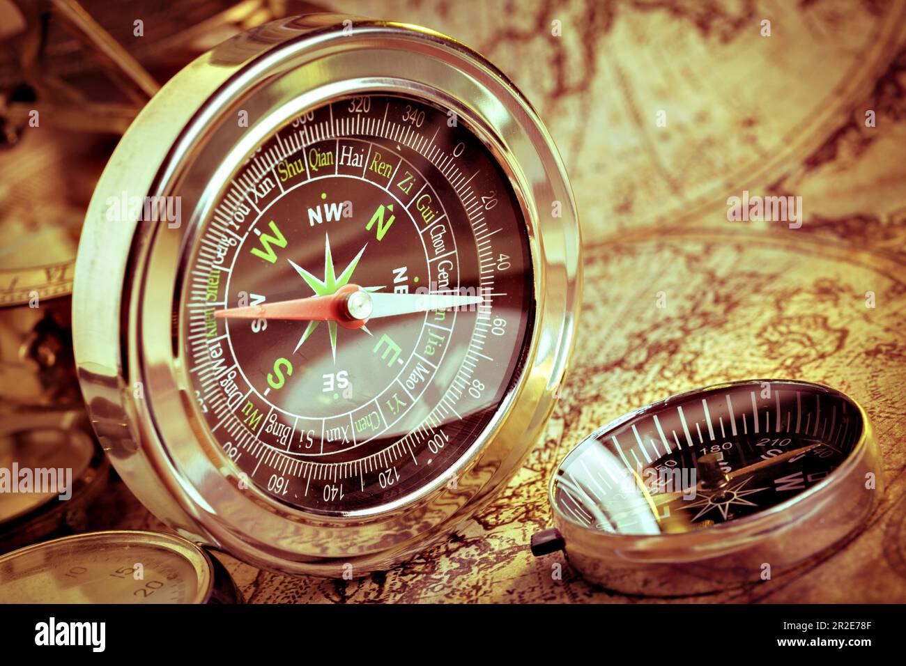 Old compass on vintage map Stock Photo - Alamy