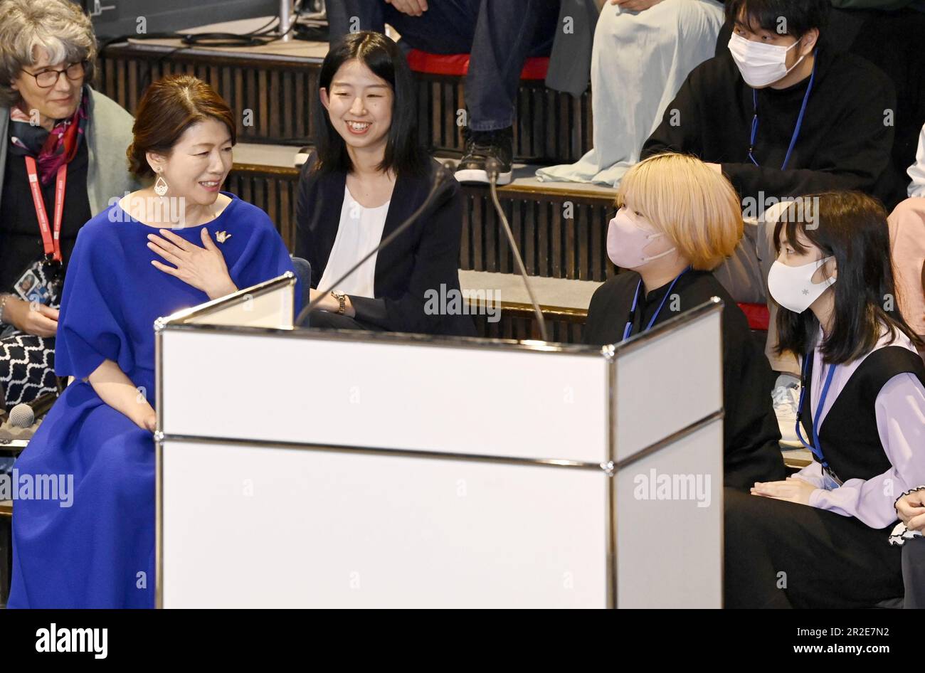 Japanese Prime Minister Fumio Kishida's wife, Yuko (blue), speaks at a ...