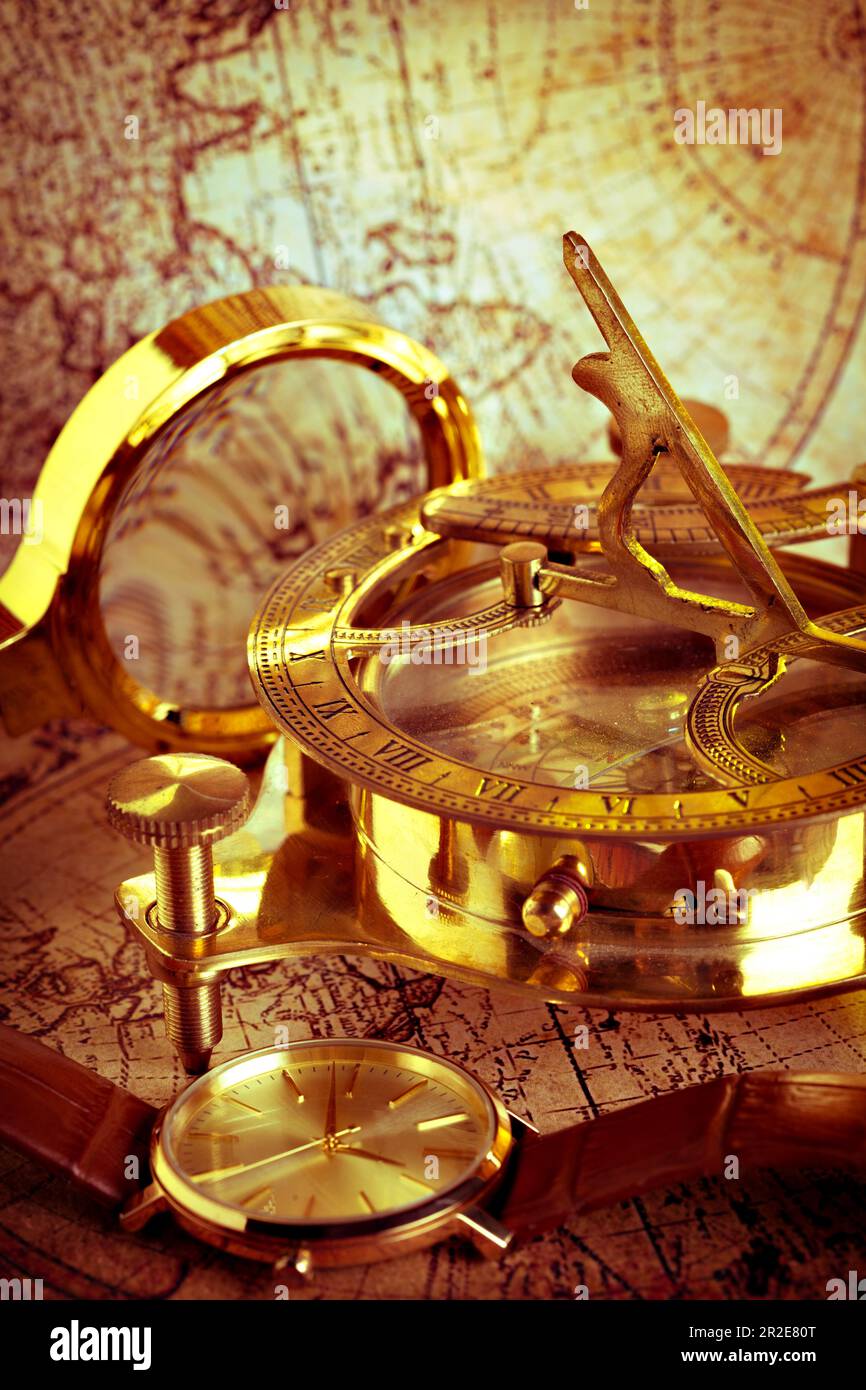 Old vintage compass and travel instruments on ancient map Stock Photo ...