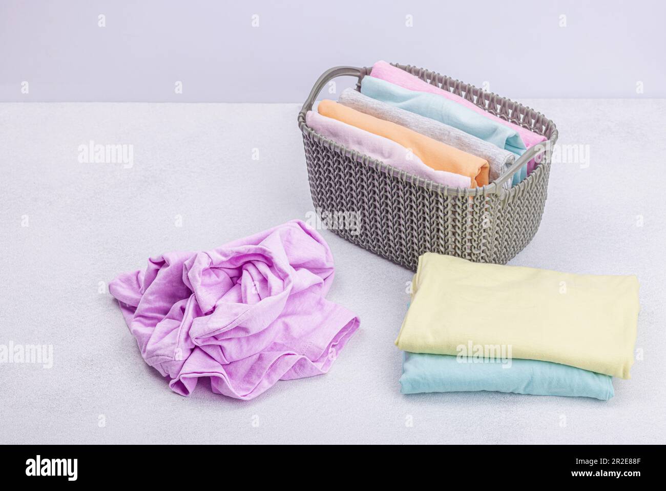 Vertical storage of clothing in the baskets. Spring closet cleaning ...