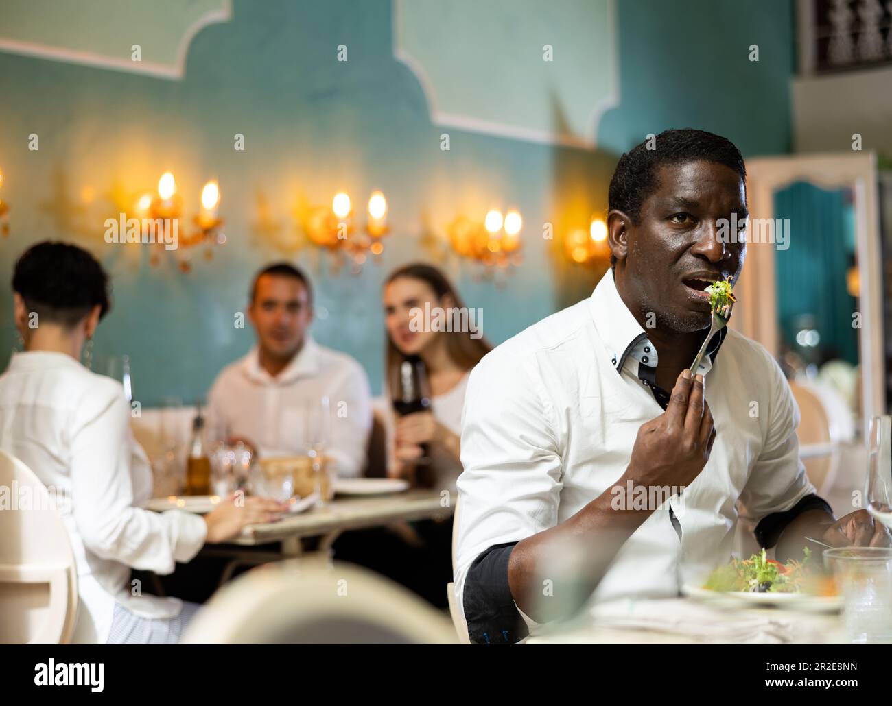 Restaurant visitor enjoying meal hi-res stock photography and images ...