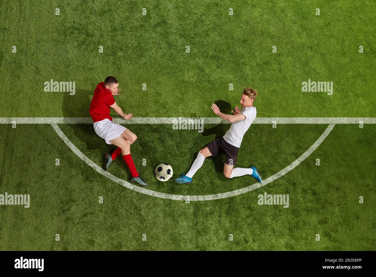Aerial view of soccer football players in sports uniform and football ...