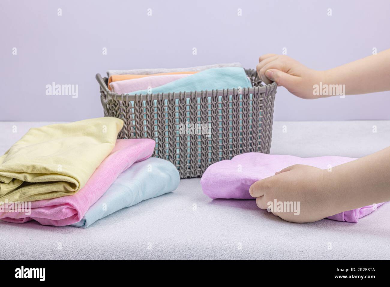 Baby girl in closet hi-res stock photography and images - Alamy