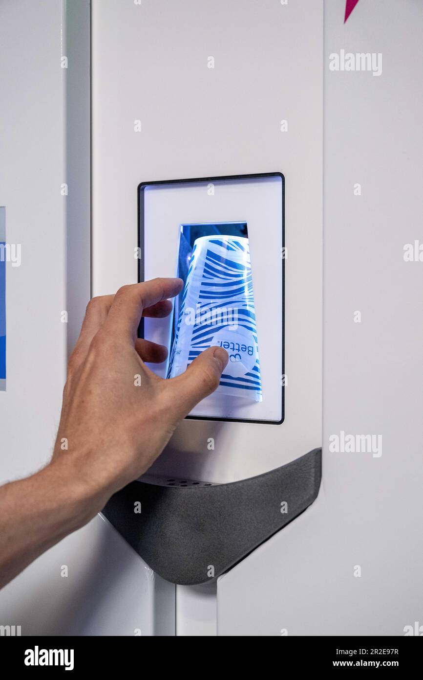 DEINZE - Smart cups are placed in an automatic return device as a demo ...