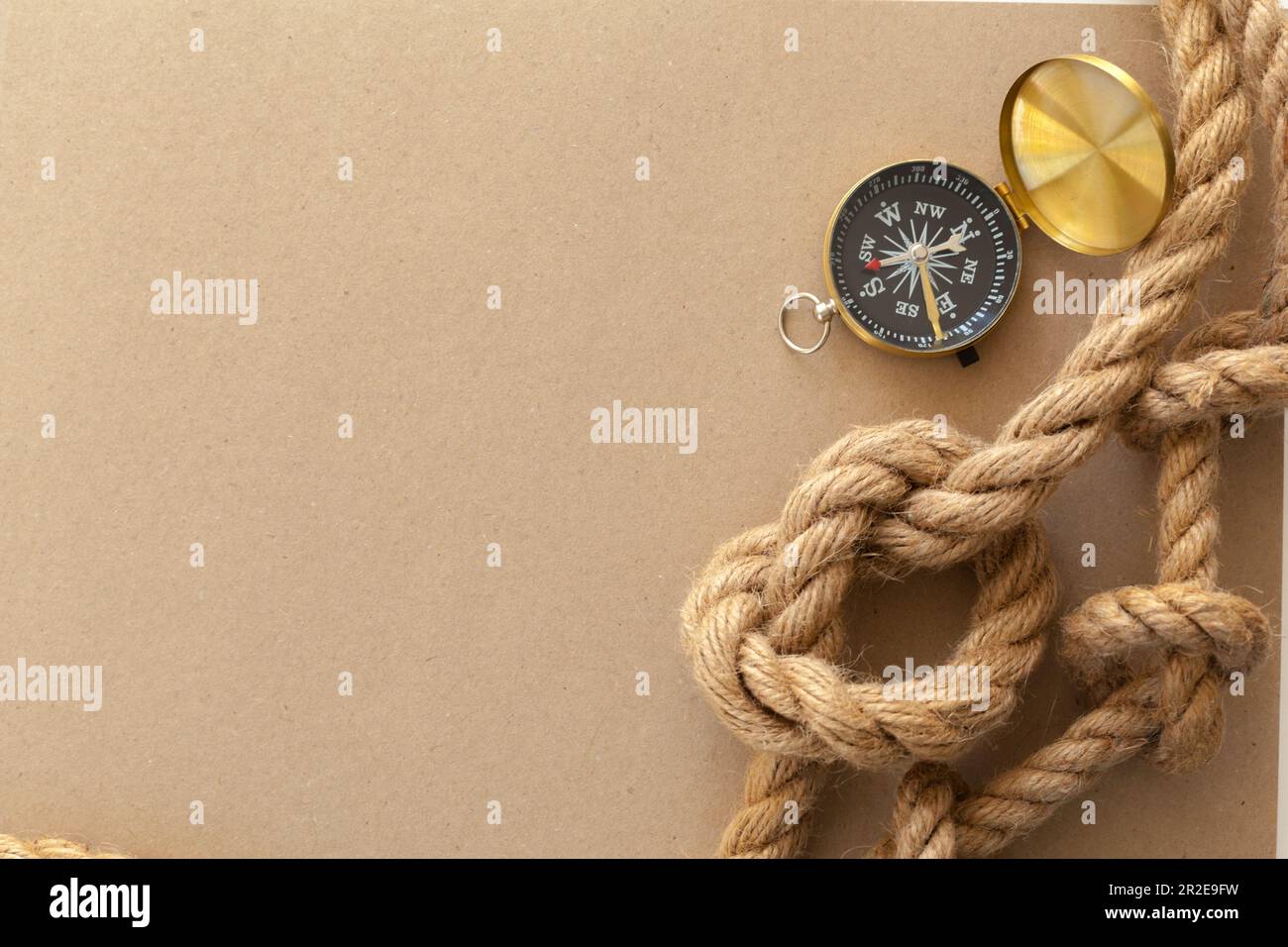 ship ropes and compass Stock Photo - Alamy