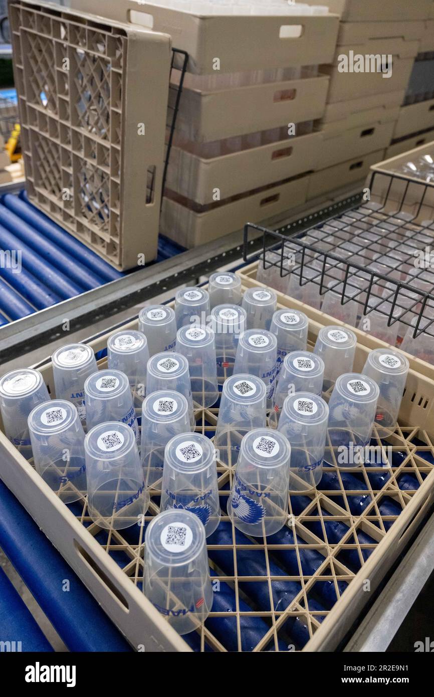 DEINZE - Smart cups are cleaned in the production area of producer ...