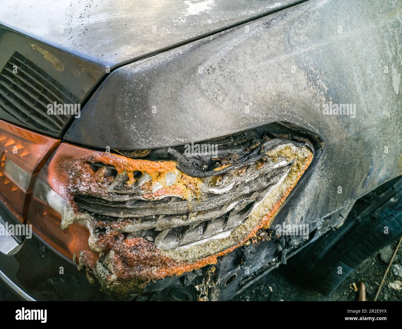 Broken and burned cars in the parking lot, accident or deliberate ...