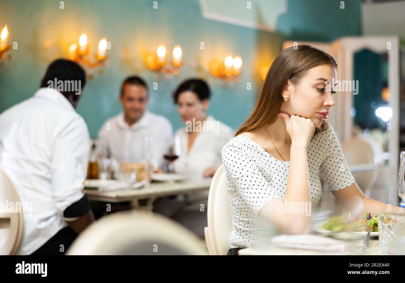 Man woman dinner table sad hi-res stock photography and images - Alamy