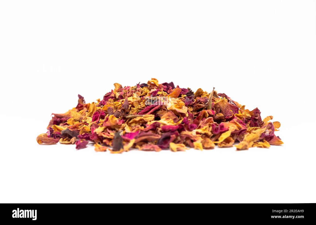 isolated handful of dried rose petals, leaves, buds on white background ...