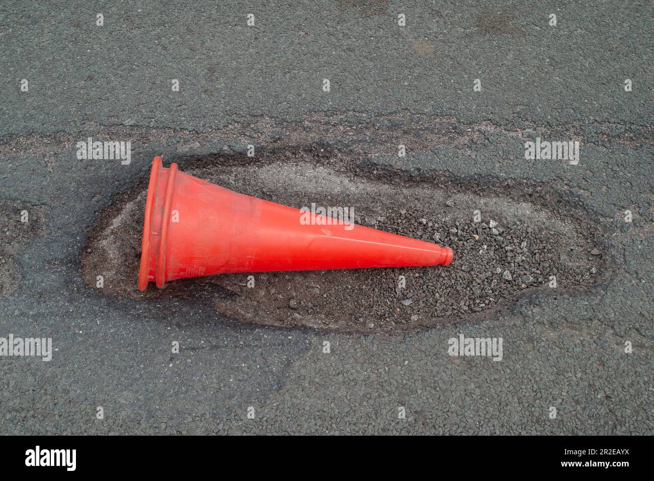 Cars over potholes hi-res stock photography and images - Alamy