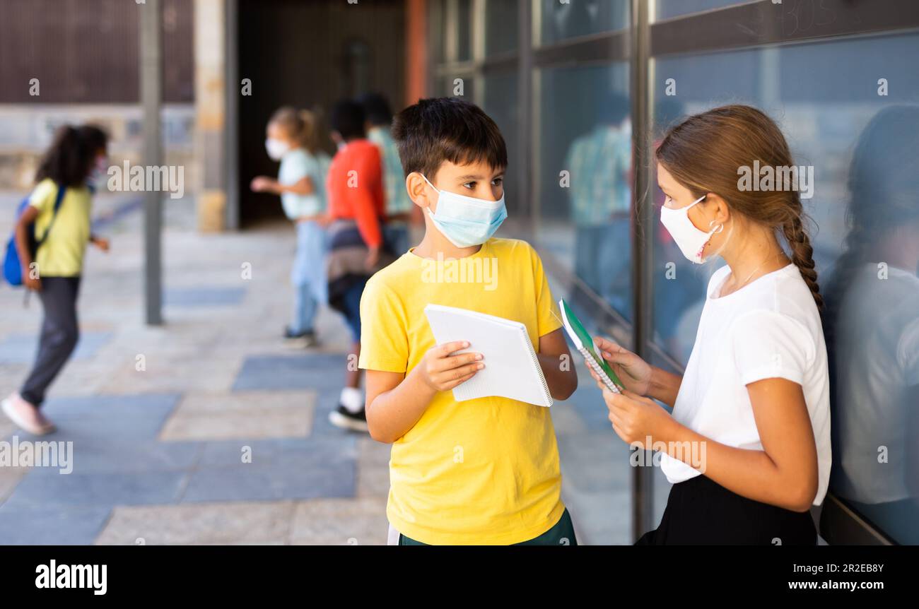 School children in masks talking outside Stock Photo - Alamy