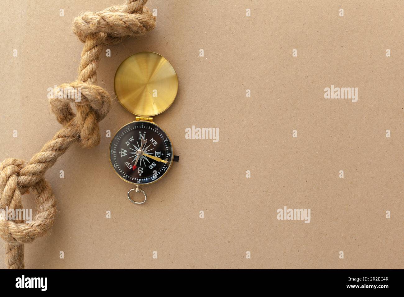 ship ropes and compass Stock Photo - Alamy