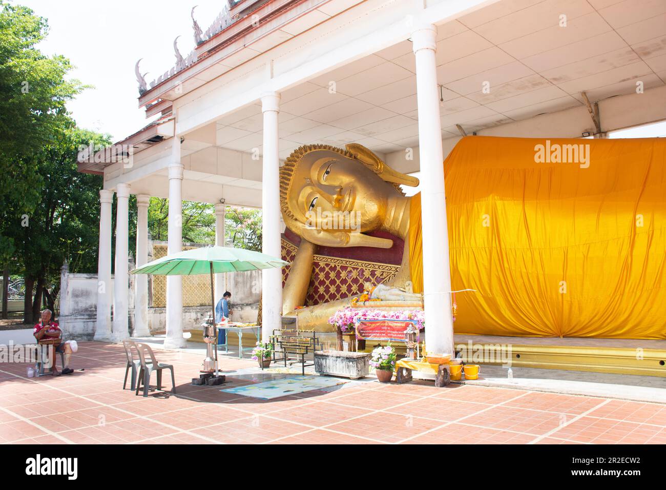 Buddha reclining attitude statue of Wat Ku or Phra Nang Rua Lom temple ...