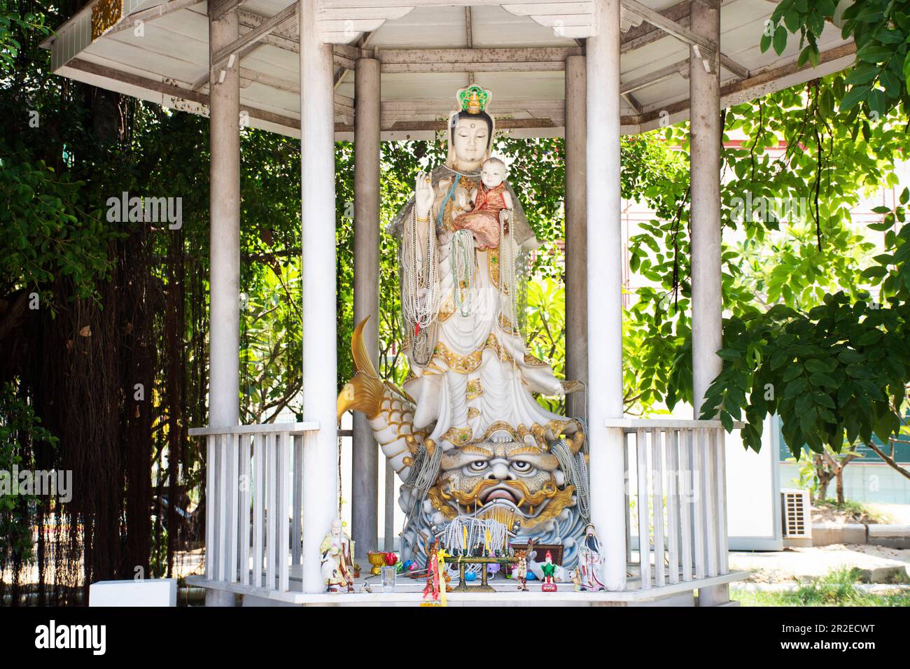 Antique deity Quan Yin or Kuan Yin chinese goddess statue in ancient ...