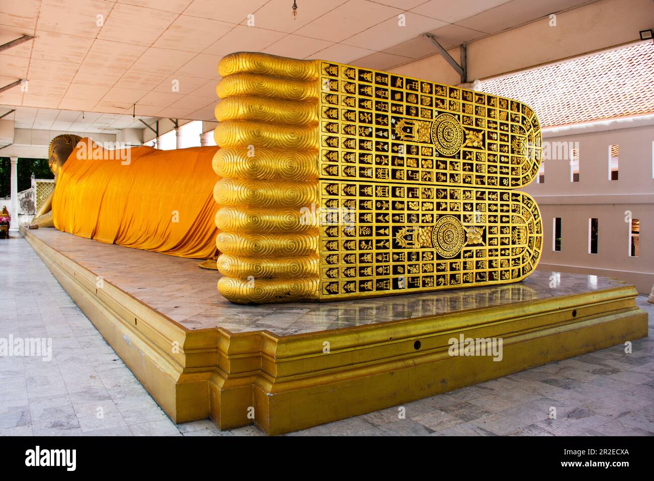 Buddha reclining attitude statue of Wat Ku or Phra Nang Rua Lom temple ...