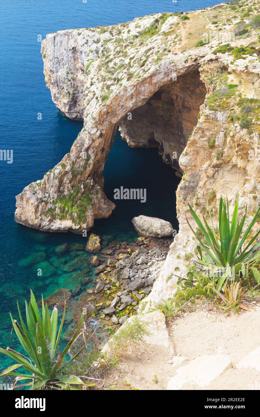 View of a natural cliff arch, the Blue Grotto, a nature landmark on ...