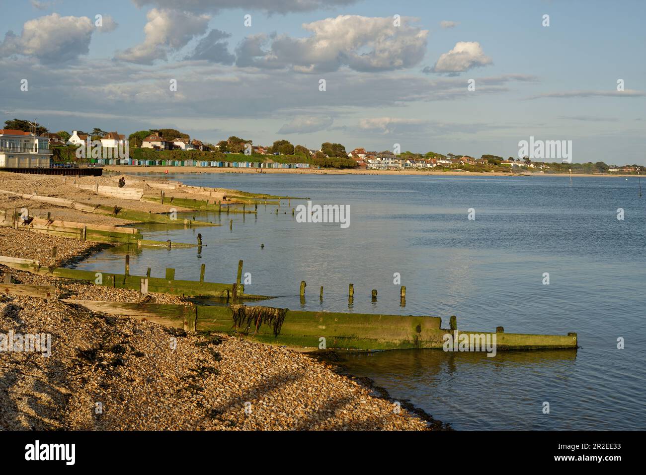 A calm sea looking across the sea towards Salterns beach, Hampshire ...