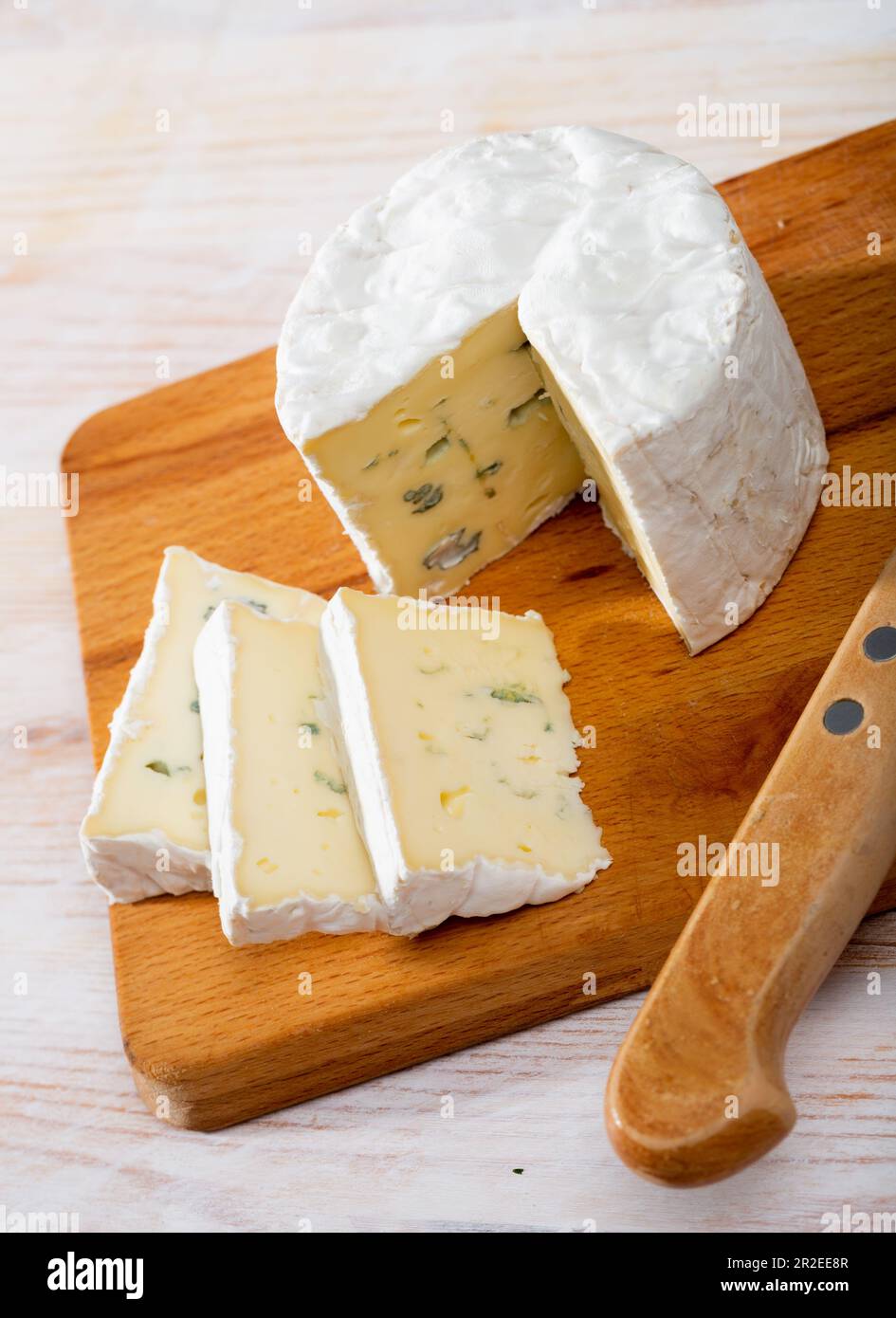 Image of slices of blue cheese with mold at wooden board Stock Photo ...