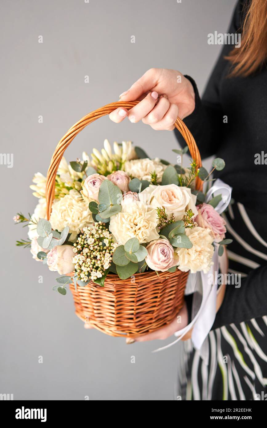 Small flower shop and Flowers delivery. Flower arrangement in Wicker ...