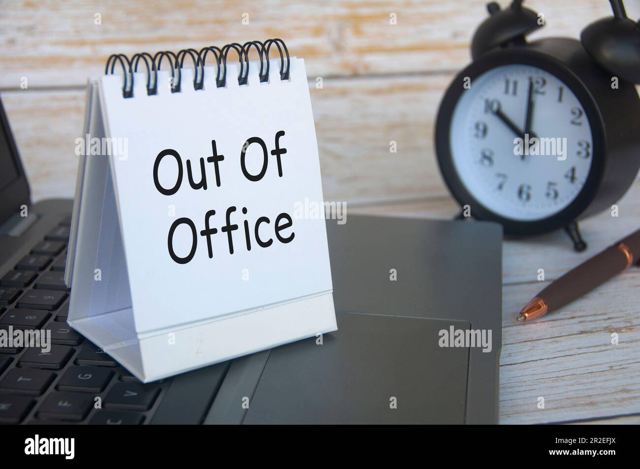 Out of office notification text on white notepad. Out of Office concept ...