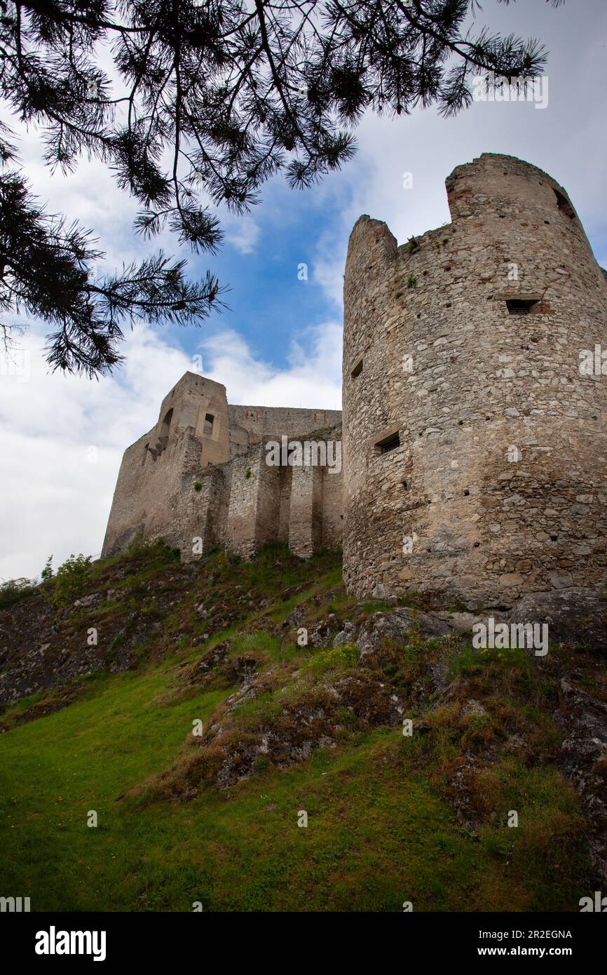 Architectural parts of a castle in ruins, the fortified circular tower ...