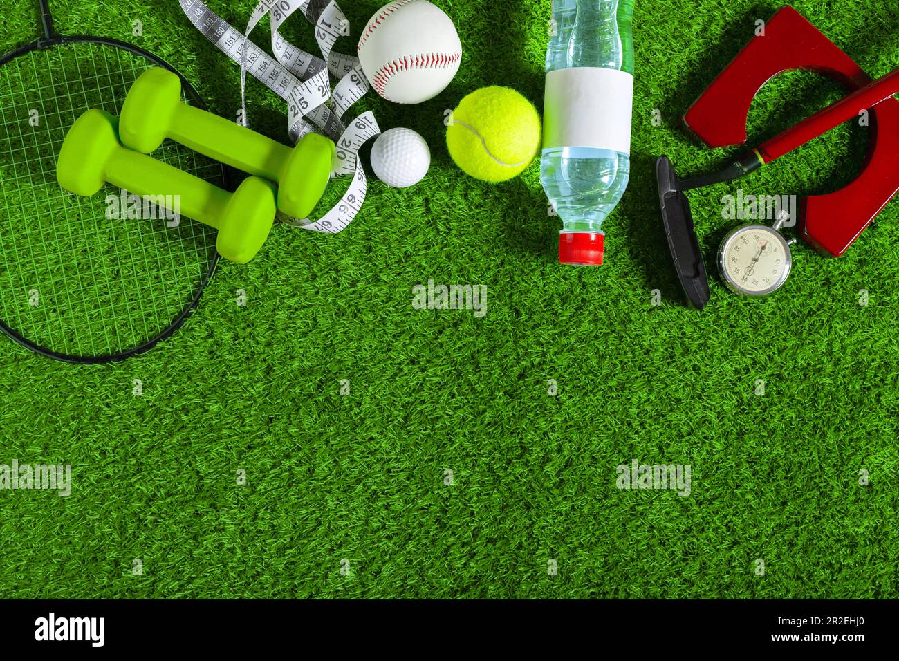 Various sport tools on grass Stock Photo - Alamy