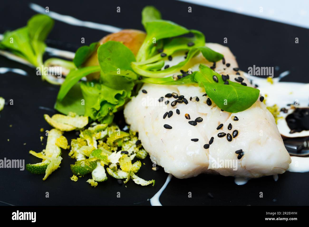 Hake in French recipe Stock Photo - Alamy