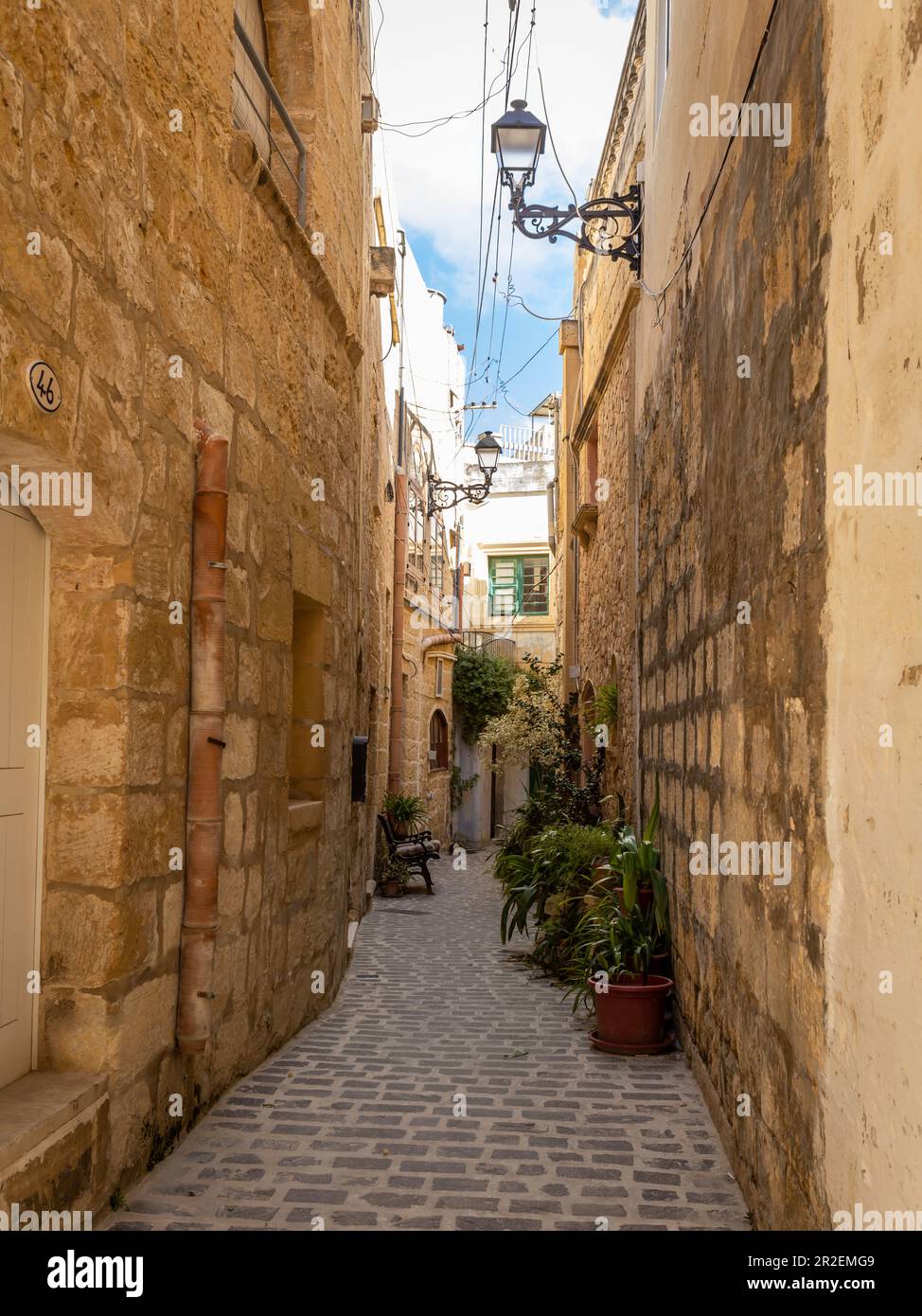 Rabat, Gozo, Malta - April 18, 2023: A narrow street with historical ...