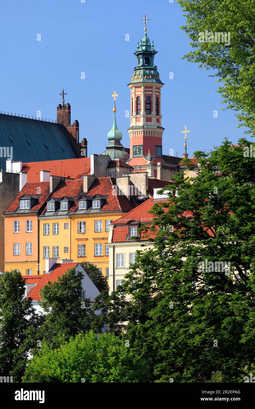 Old town view from the bank of the river Vistula. Tower of the church ...