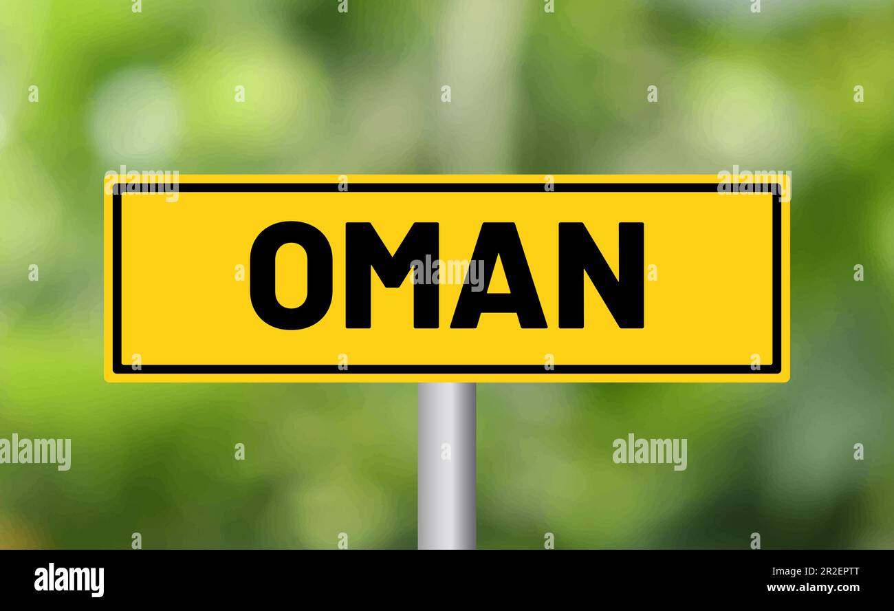 Oman road sign on blur background Stock Photo - Alamy