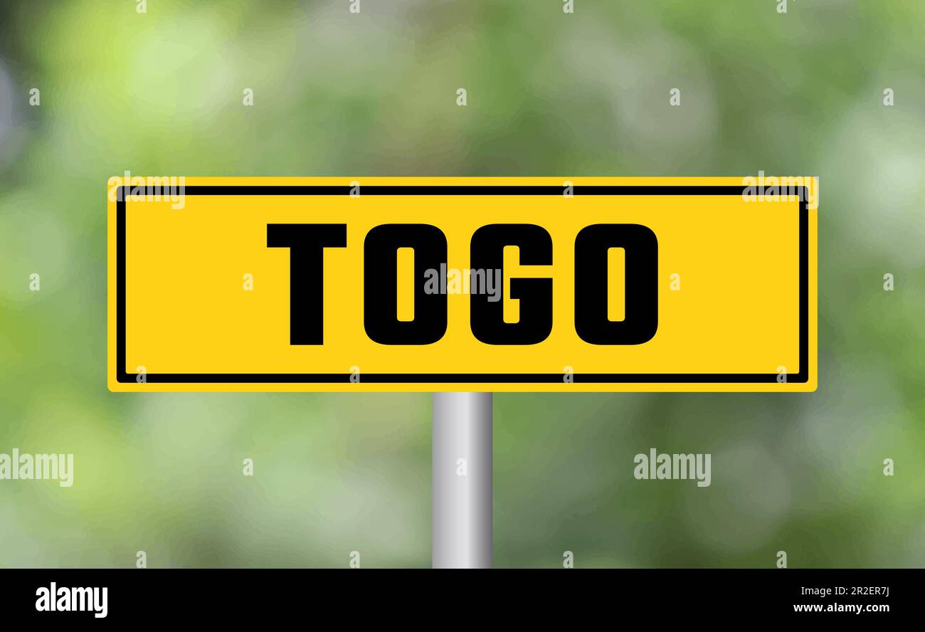 Togo road sign on blur background Stock Photo - Alamy