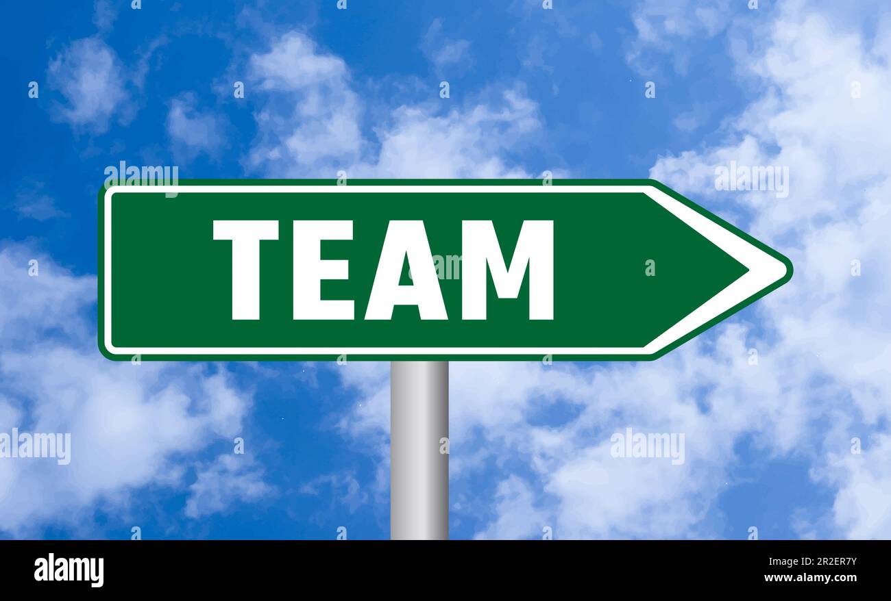 Team road sign on cloudy sky background Stock Photo - Alamy