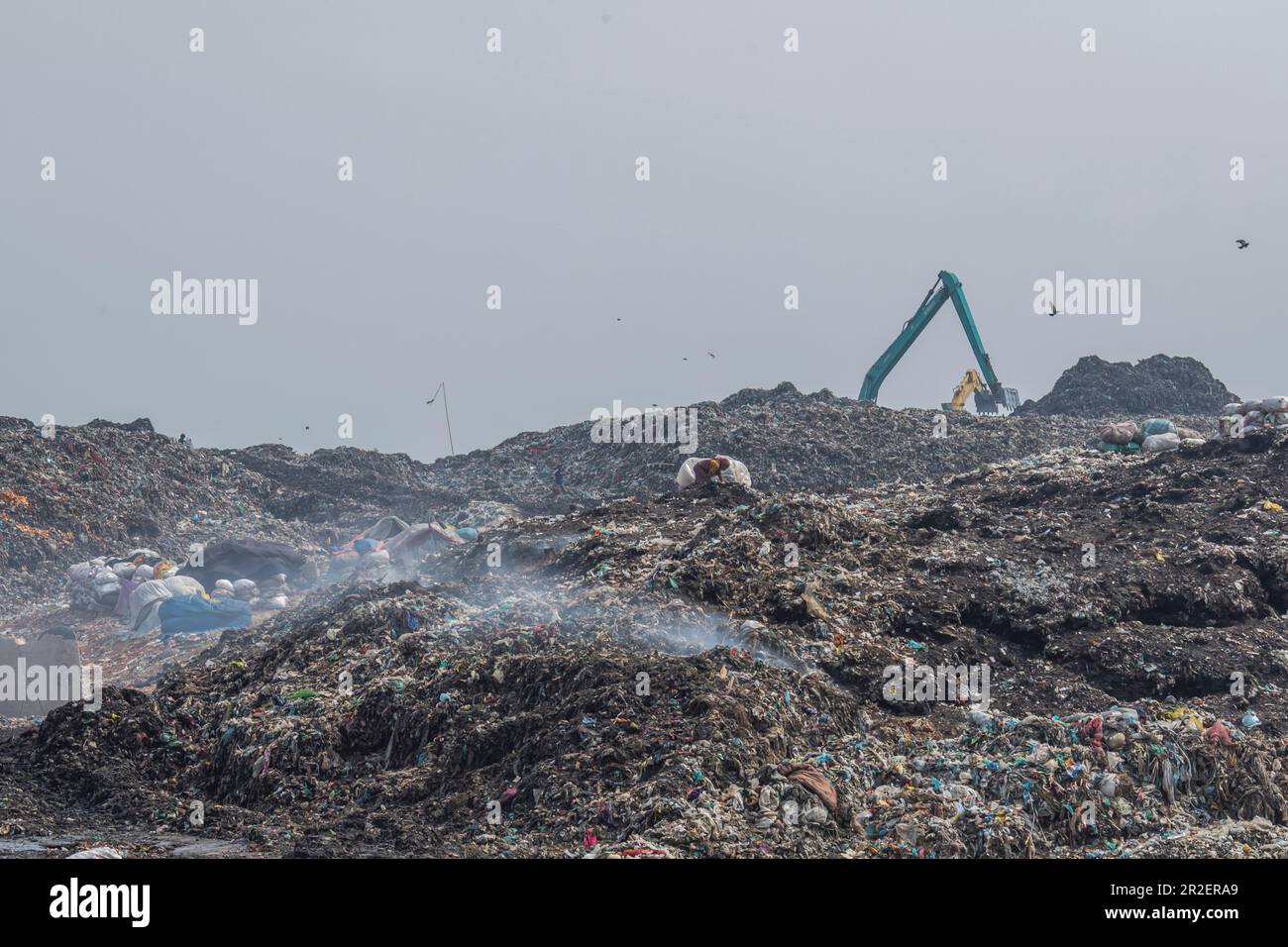 View of a garbage landfill site in Amin Bazar around the outskirts of ...