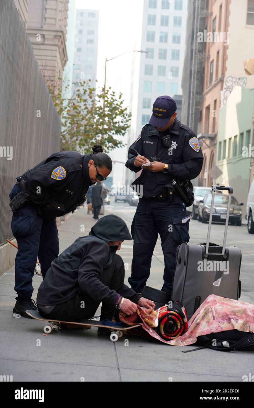 Officer Dominique Ellis (left) and Officer Steven Ogbonna (right) talk ...