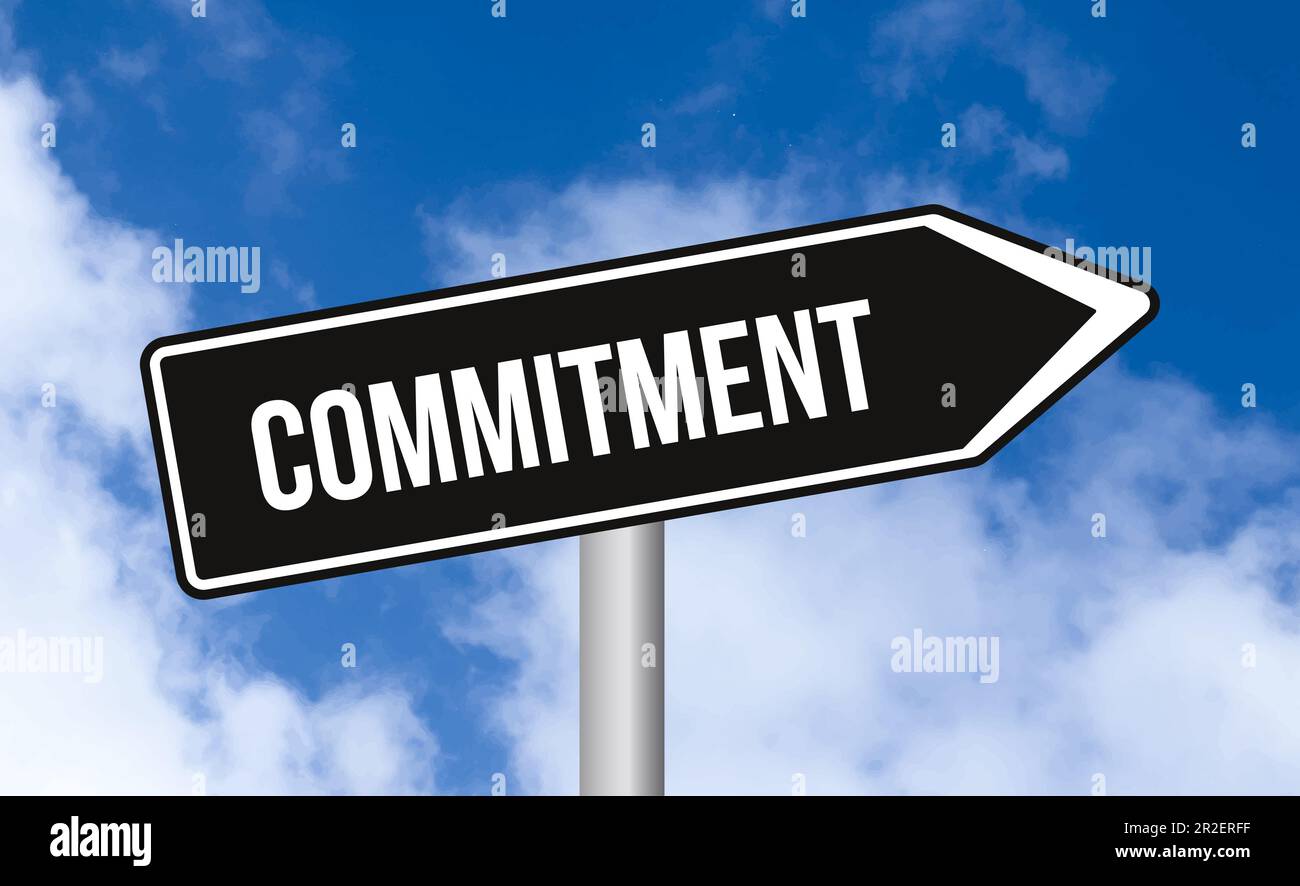 Commitment road sign on blue sky background Stock Photo - Alamy