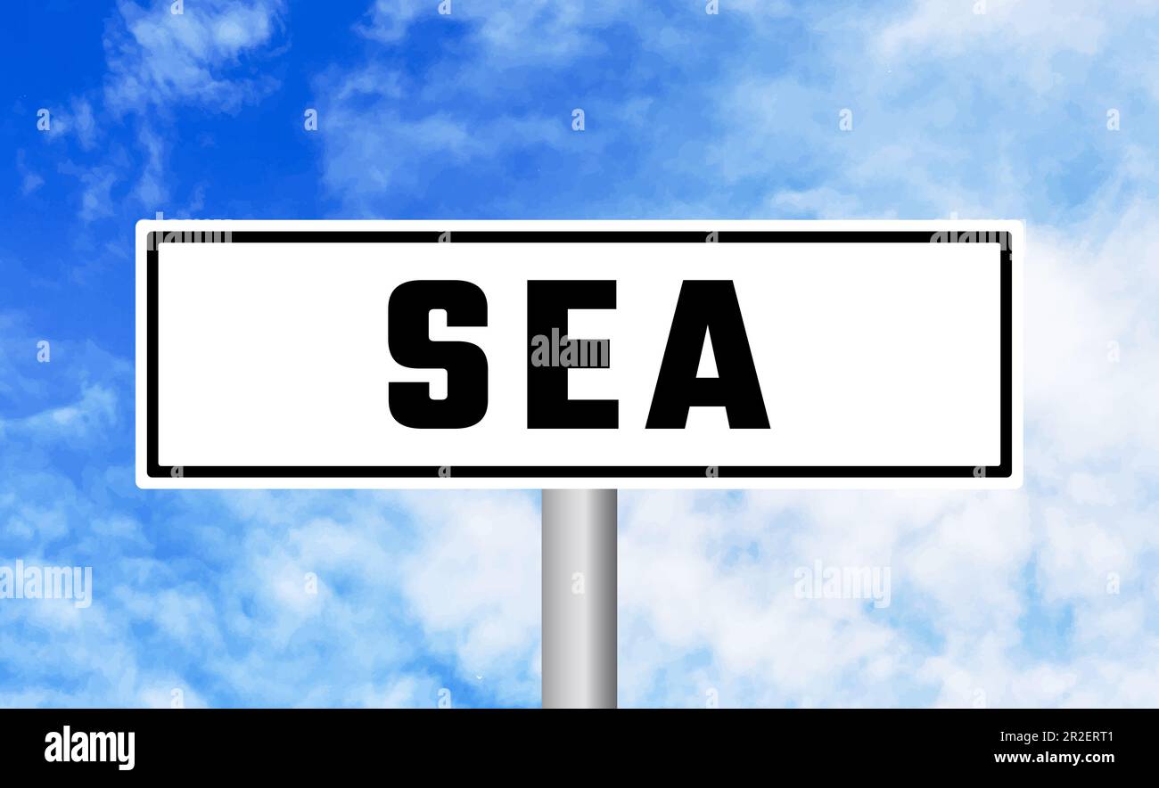 Sea road sign on sky background Stock Photo - Alamy