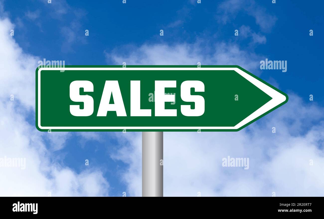 Sales road sign on cloudy sky background Stock Photo - Alamy