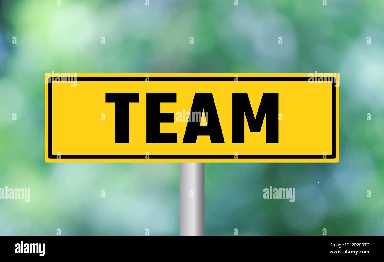 Team road sign on blur background Stock Photo - Alamy