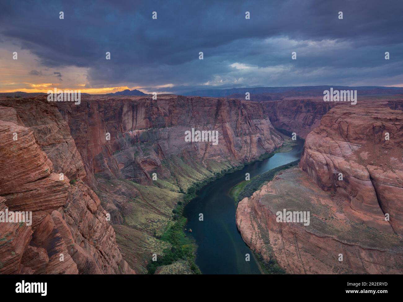 Colorado River on Horseshoe Bend in sunset after thunderstorm, USA ...